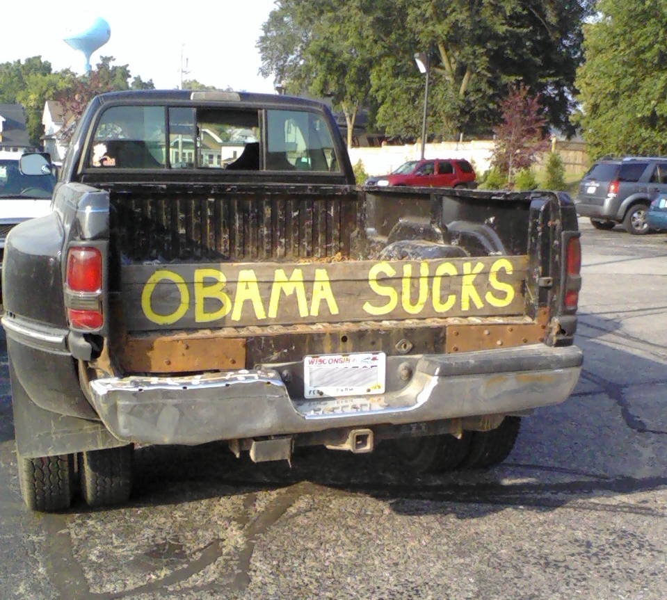 He was 5’10”, brown eyes, wearing an Obama ’08 bumper sticker